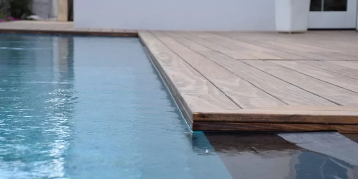 New construction - bringing wood decking to pool edge - All Swimming ...
